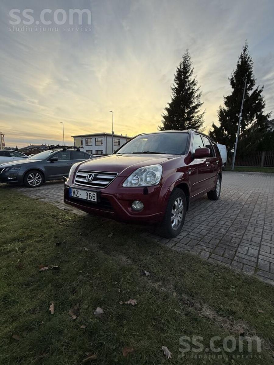 Sarkans Honda CR-V 2006 Rīga, ar dzinēja tilpumu 2.00 L un nobraukumu 202 tūkst. km par 2600 €, foto 1 vietnē AUTOMOTO.COM.LV