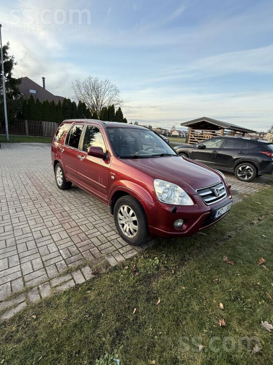 Sarkans Honda CR-V 2006 Rīga, ar dzinēja tilpumu 2.00 L un nobraukumu 202 tūkst. km par 2600 €, foto 3 vietnē AUTOMOTO.COM.LV