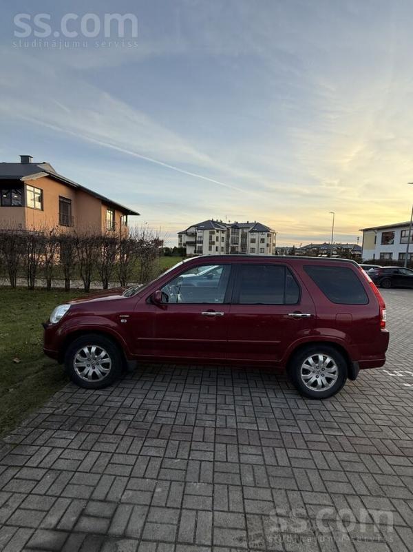 Sarkans Honda CR-V 2006 Rīga, ar dzinēja tilpumu 2.00 L un nobraukumu 202 tūkst. km par 2600 €, foto 3 vietnē AUTOMOTO.COM.LV