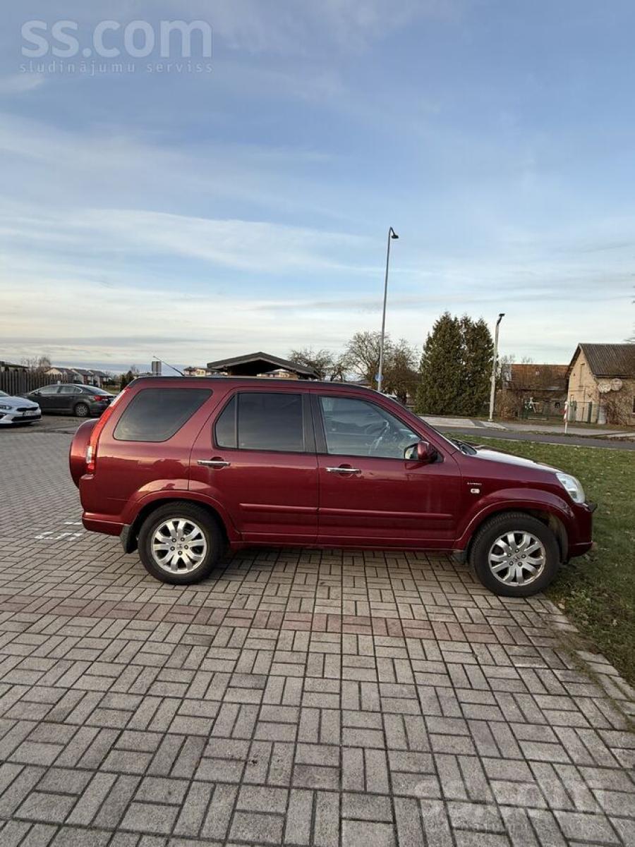 Sarkans Honda CR-V 2006 Rīga, ar dzinēja tilpumu 2.00 L un nobraukumu 202 tūkst. km par 2600 €, foto 6 vietnē AUTOMOTO.COM.LV