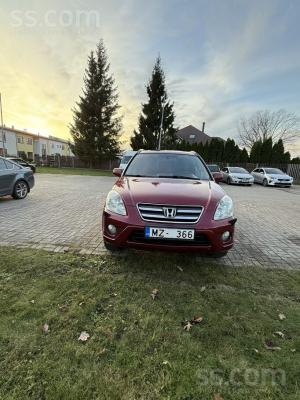 Sarkans Honda CR-V 2006 Rīga, ar dzinēja tilpumu 2.00 L un nobraukumu 202 tūkst. km par 2600 €, foto 7 vietnē AUTOMOTO.COM.LV