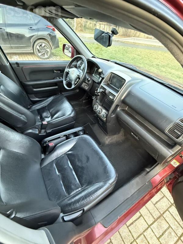 Sarkans Honda CR-V 2006 Rīga, ar dzinēja tilpumu 2.00 L un nobraukumu 202 tūkst. km par 2600 €, foto 7 vietnē AUTOMOTO.COM.LV