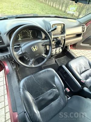 Sarkans Honda CR-V 2006 Rīga, ar dzinēja tilpumu 2.00 L un nobraukumu 202 tūkst. km par 2600 €, foto 11 vietnē AUTOMOTO.COM.LV