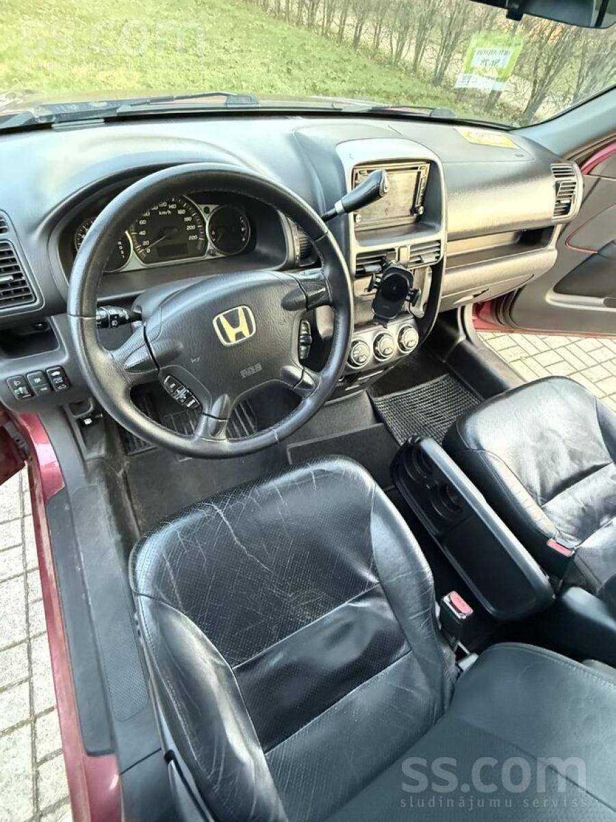 Sarkans Honda CR-V 2006 Rīga, ar dzinēja tilpumu 2.00 L un nobraukumu 202 tūkst. km par 2600 €, foto 11 vietnē AUTOMOTO.COM.LV