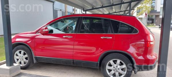 Red Honda CR-V 2007 in Riga, with an engine capacity of 2.00 L and mileage of 187 thousand km for 4500 €, photo 1 on AUTOMOTO.COM.LV