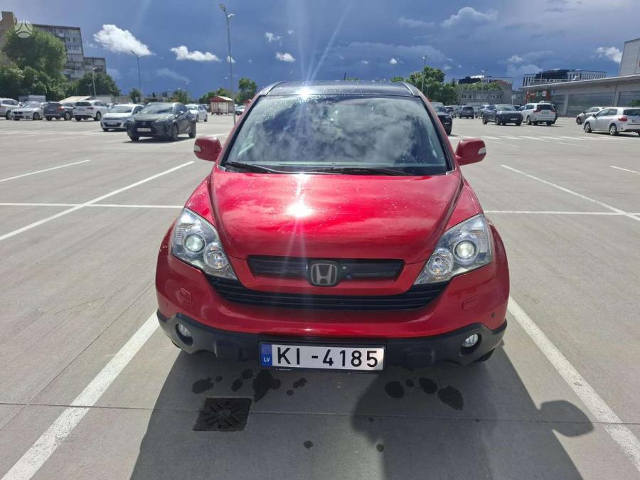 Red Honda CR-V 2007 in Vilnius, with an engine capacity of 2.00 L and mileage of 328 thousand km for 4800 €, photo 3 on AUTOMOTO.COM.LV