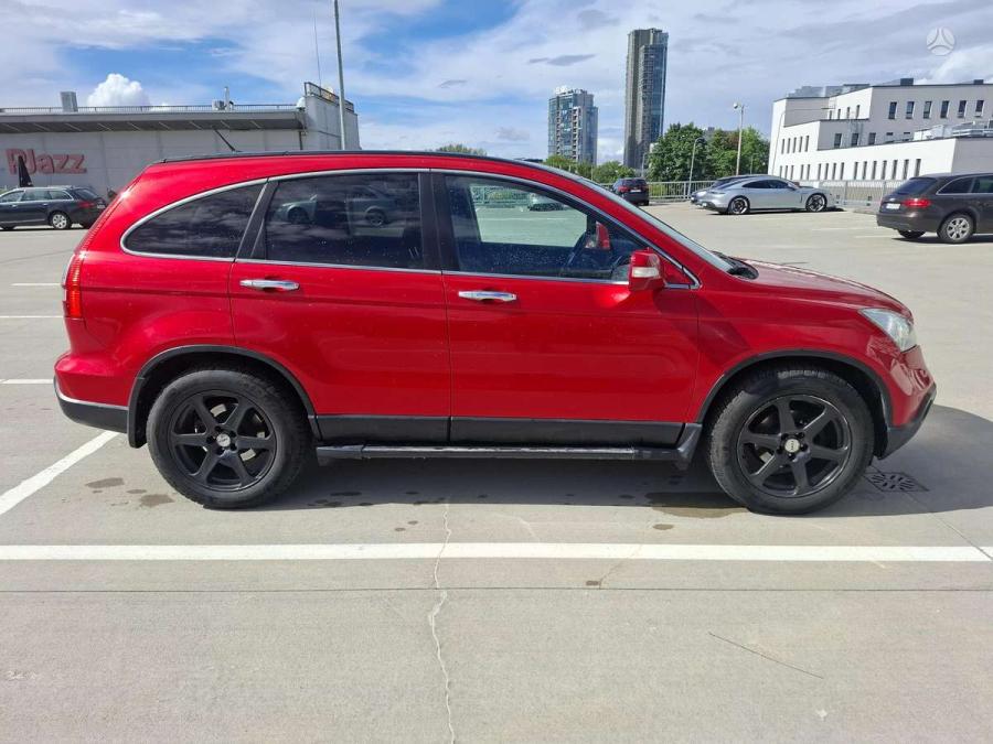 Red Honda CR-V 2007 in Vilnius, with an engine capacity of 2.00 L and mileage of 328 thousand km for 4800 €, photo 5 on AUTOMOTO.COM.LV