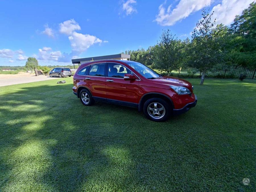 Red Honda CR-V 2007 in Silute, with an engine capacity of 2.20 L and mileage of 286 thousand km for 4200 €, photo 1 on AUTOMOTO.COM.LV