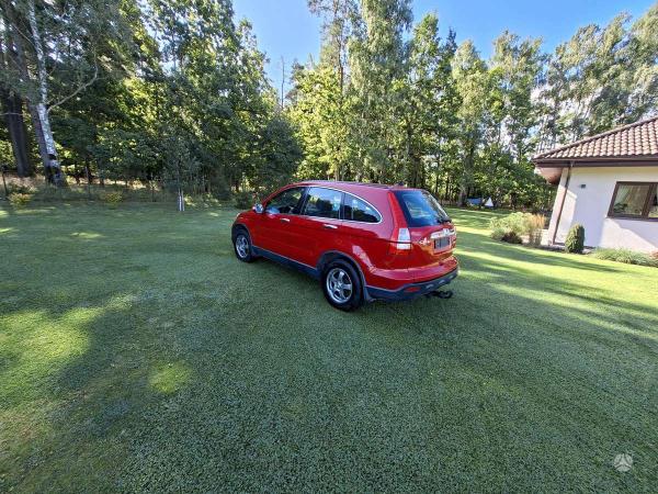 Red Honda CR-V 2007 in Silute, with an engine capacity of 2.20 L and mileage of 286 thousand km for 4200 €, photo 4 on AUTOMOTO.COM.LV