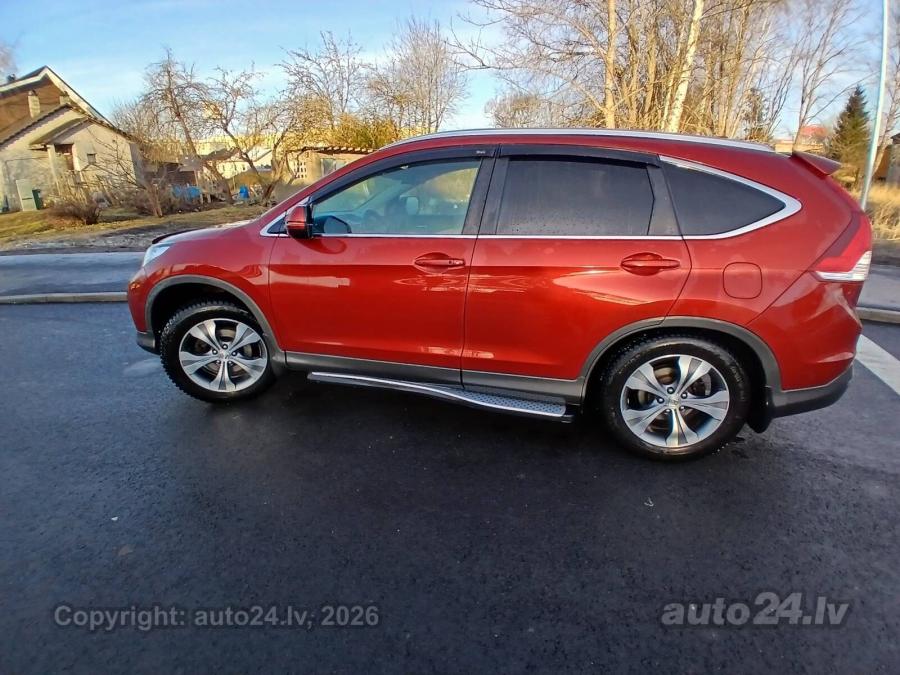 Red Honda CR-V 2012 in Tallinn, with an engine capacity of 2.20 L and mileage of 338 thousand km for 8000 €, photo 1 on AUTOMOTO.COM.LV