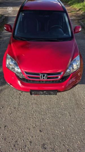 Sarkans Honda CR-V 2012 Šauļi, ar dzinēja tilpumu 2.20 L un nobraukumu 248 tūkst. km par 6999 €, foto 10 vietnē AUTOMOTO.COM.LV