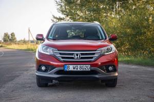 Red Honda CR-V 2012 in Elektrenai, with an engine capacity of 2.00 L and mileage of 143 thousand km for 12650 €, photo 3 on AUTOMOTO.COM.LV