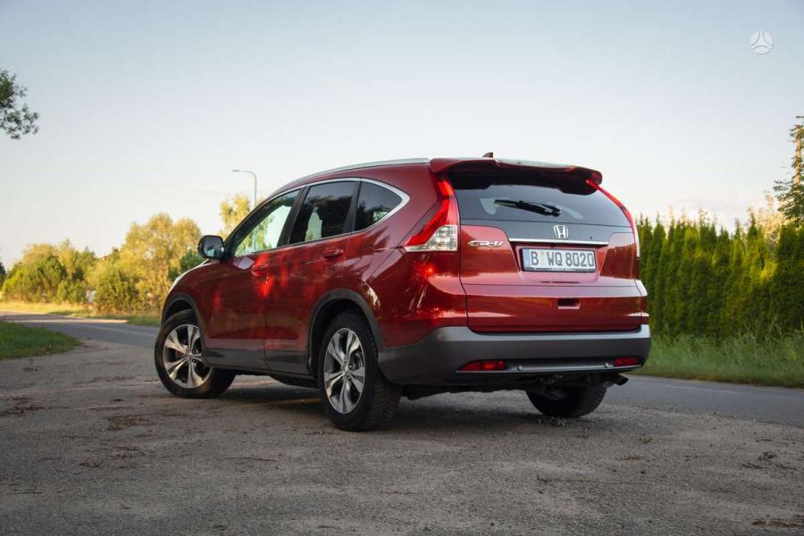 Red Honda CR-V 2012 in Elektrenai, with an engine capacity of 2.00 L and mileage of 143 thousand km for 12650 €, photo 6 on AUTOMOTO.COM.LV