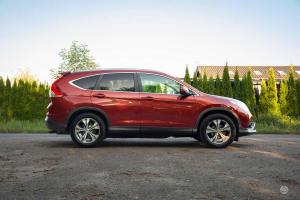 Red Honda CR-V 2012 in Elektrenai, with an engine capacity of 2.00 L and mileage of 143 thousand km for 12650 €, photo 9 on AUTOMOTO.COM.LV