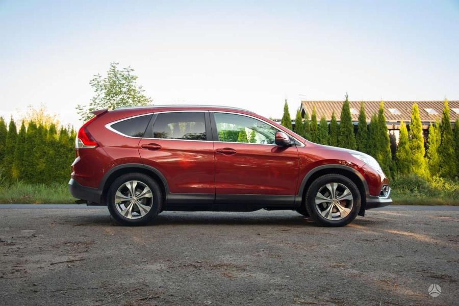 Red Honda CR-V 2012 in Elektrenai, with an engine capacity of 2.00 L and mileage of 143 thousand km for 12650 €, photo 9 on AUTOMOTO.COM.LV