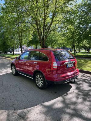 Red Honda CR-V 2012 in Klaipeda, with an engine capacity of 2.20 L and mileage of 340 thousand km for 6750 €, photo 7 on AUTOMOTO.COM.LV