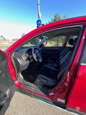 Red Honda CR-V 2012 in Klaipeda, with an engine capacity of 2.20 L and mileage of 340 thousand km for 6750 €, photo 15 on AUTOMOTO.COM.LV