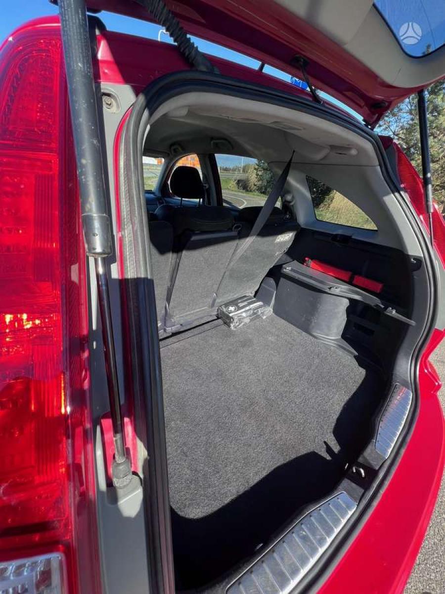 Red Honda CR-V 2012 in Klaipeda, with an engine capacity of 2.20 L and mileage of 340 thousand km for 6750 €, photo 18 on AUTOMOTO.COM.LV