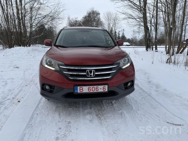 Red Honda CR-V 2013 in Gulbene, with an engine capacity of 2.20 L and mileage of 264 thousand km for 9000 €, photo 2 on AUTOMOTO.COM.LV
