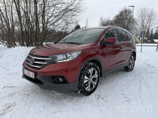 Red Honda CR-V 2013 in Gulbene, with an engine capacity of 2.20 L and mileage of 264 thousand km for 9000 €, photo 3 on AUTOMOTO.COM.LV