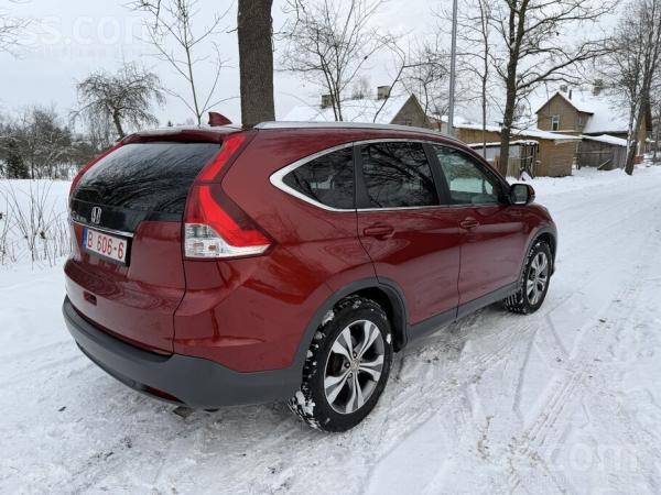 Red Honda CR-V 2013 in Gulbene, with an engine capacity of 2.20 L and mileage of 264 thousand km for 9000 €, photo 5 on AUTOMOTO.COM.LV