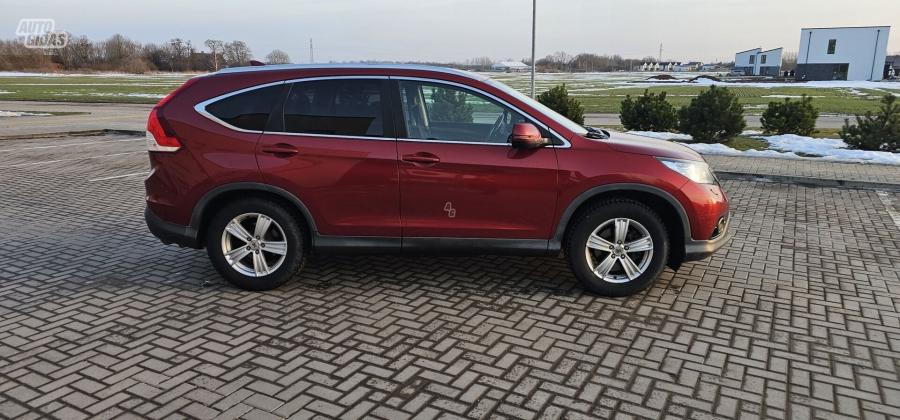 Sarkans Honda CR-V 2013 Kauņa, ar dzinēja tilpumu 2.20 L un nobraukumu 270 tūkst. km par 8650 €, foto 10 vietnē AUTOMOTO.COM.LV