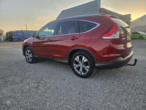 Sarkans Honda CR-V 2013 Radviliškis, ar dzinēja tilpumu 2.20 L un nobraukumu 298 tūkst. km par 9800 €, foto 6 vietnē AUTOMOTO.COM.LV