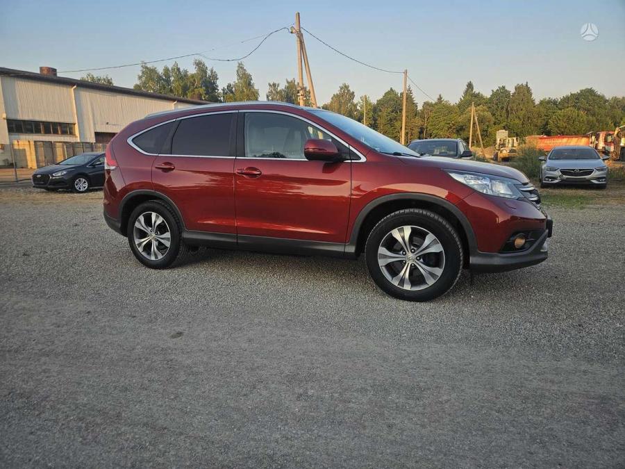 Sarkans Honda CR-V 2013 Radviliškis, ar dzinēja tilpumu 2.20 L un nobraukumu 298 tūkst. km par 9800 €, foto 10 vietnē AUTOMOTO.COM.LV