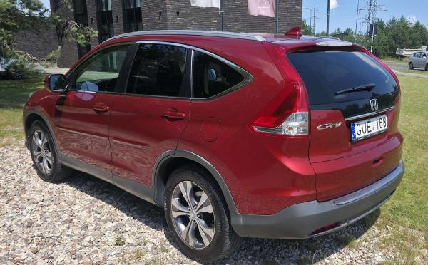 Red Honda CR-V 2013 in Vilnius, with an engine capacity of 2.20 L and mileage of 252 thousand km for 9455 €, photo 3 on AUTOMOTO.COM.LV
