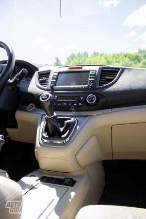 Sarkans Honda CR-V 2013 Kauņa, ar dzinēja tilpumu 2.20 L un nobraukumu 245 tūkst. km par 10300 €, foto 14 vietnē AUTOMOTO.COM.LV