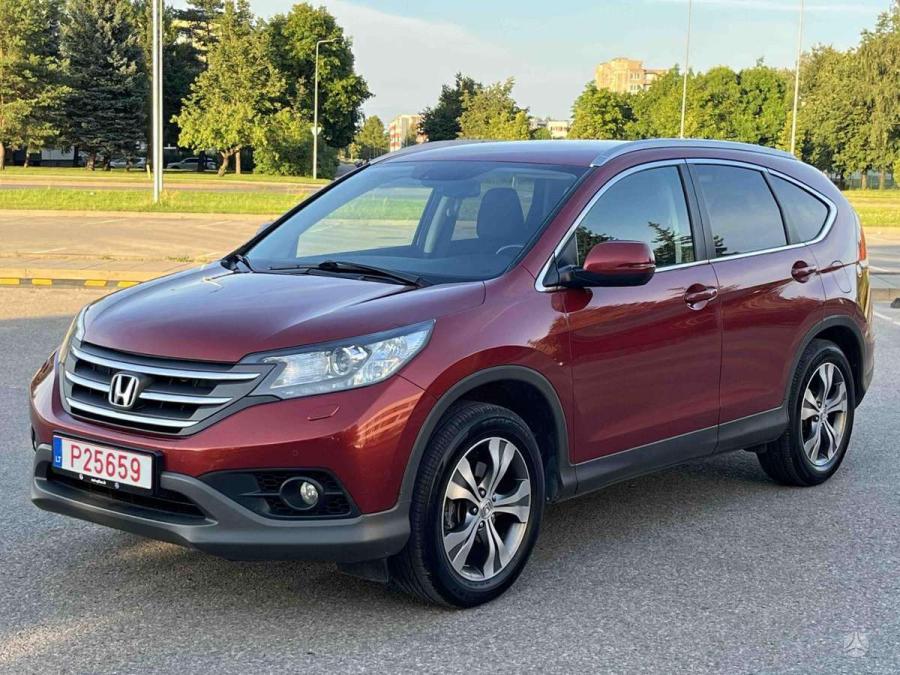 Red Honda CR-V 2013 in Jonava, with an engine capacity of 2.20 L and mileage of 311 thousand km for 8600 €, photo 1 on AUTOMOTO.COM.LV