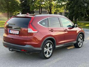 Red Honda CR-V 2013 in Jonava, with an engine capacity of 2.20 L and mileage of 311 thousand km for 8600 €, photo 3 on AUTOMOTO.COM.LV