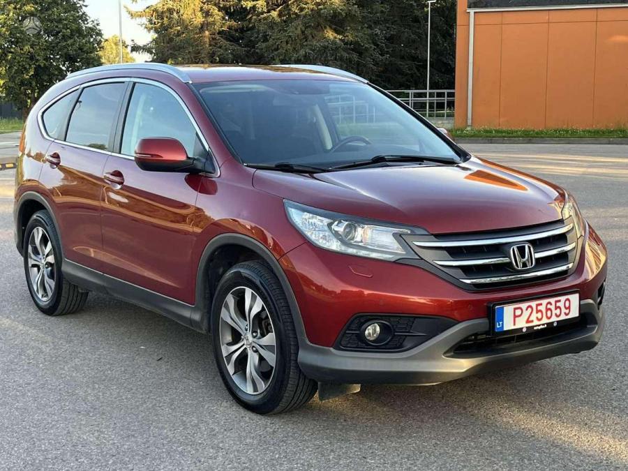 Red Honda CR-V 2013 in Jonava, with an engine capacity of 2.20 L and mileage of 311 thousand km for 8600 €, photo 5 on AUTOMOTO.COM.LV