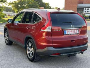 Red Honda CR-V 2013 in Jonava, with an engine capacity of 2.20 L and mileage of 311 thousand km for 8600 €, photo 6 on AUTOMOTO.COM.LV
