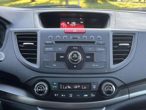 Red Honda CR-V 2013 in Jonava, with an engine capacity of 2.20 L and mileage of 311 thousand km for 8600 €, photo 21 on AUTOMOTO.COM.LV