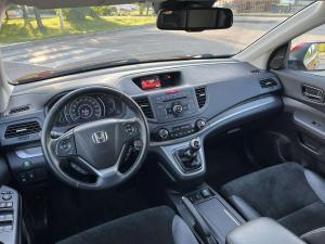 Red Honda CR-V 2013 in Jonava, with an engine capacity of 2.20 L and mileage of 311 thousand km for 8600 €, photo 23 on AUTOMOTO.COM.LV