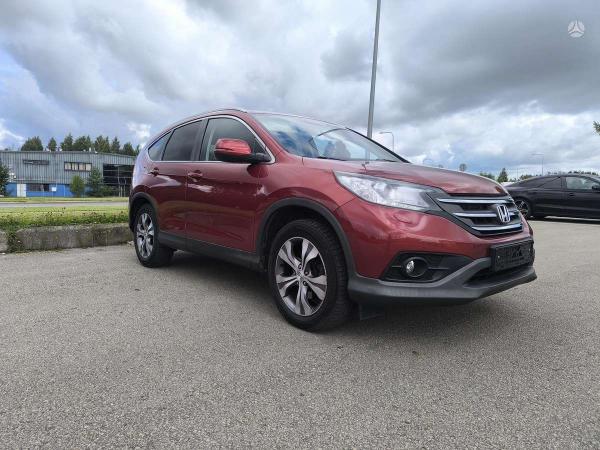 Sarkans Honda CR-V 2013 Panevēža, ar dzinēja tilpumu 2.20 L un nobraukumu 225 tūkst. km par 8900 €, foto 1 vietnē AUTOMOTO.COM.LV