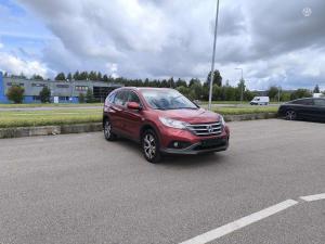 Red Honda CR-V 2013 in Panevezys, with an engine capacity of 2.20 L and mileage of 225 thousand km for 8900 €, photo 5 on AUTOMOTO.COM.LV