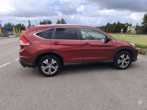 Red Honda CR-V 2013 in Panevezys, with an engine capacity of 2.20 L and mileage of 225 thousand km for 8900 €, photo 7 on AUTOMOTO.COM.LV