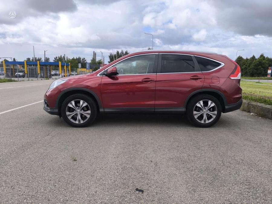 Red Honda CR-V 2013 in Panevezys, with an engine capacity of 2.20 L and mileage of 225 thousand km for 8900 €, photo 8 on AUTOMOTO.COM.LV