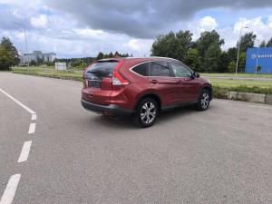 Red Honda CR-V 2013 in Panevezys, with an engine capacity of 2.20 L and mileage of 225 thousand km for 8900 €, photo 10 on AUTOMOTO.COM.LV