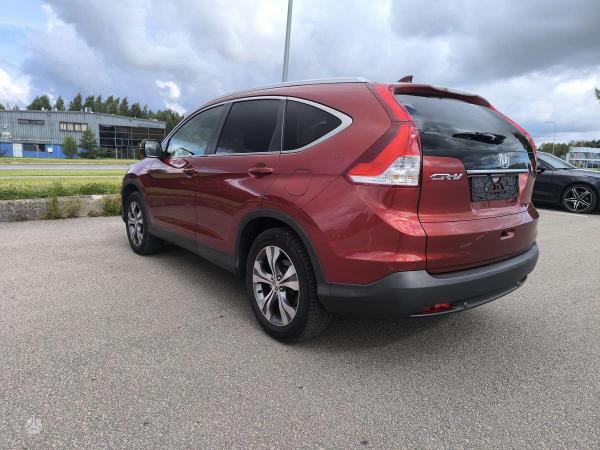 Sarkans Honda CR-V 2013 Panevēža, ar dzinēja tilpumu 2.20 L un nobraukumu 225 tūkst. km par 8900 €, foto 11 vietnē AUTOMOTO.COM.LV