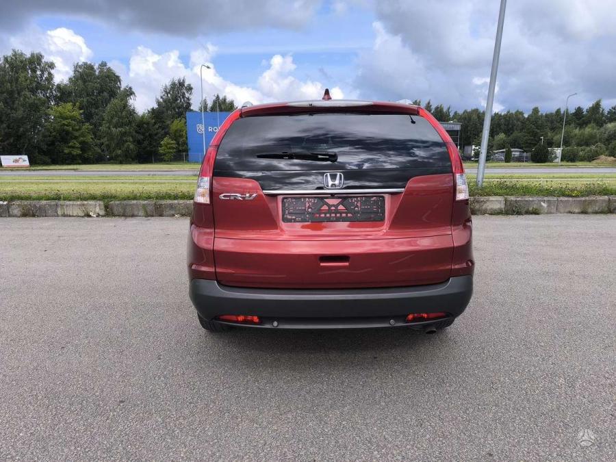 Red Honda CR-V 2013 in Panevezys, with an engine capacity of 2.20 L and mileage of 225 thousand km for 8900 €, photo 13 on AUTOMOTO.COM.LV