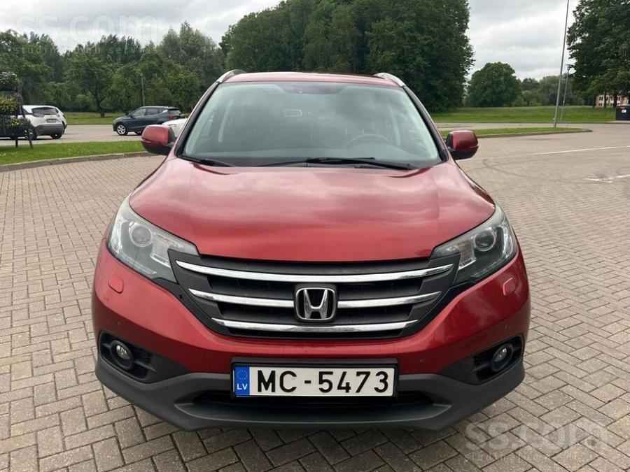 Red Honda CR-V 2014 in Riga, with an engine capacity of 1.60 L and mileage of 253 thousand km for 9300 €, photo 8 on AUTOMOTO.COM.LV