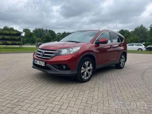 Red Honda CR-V 2014 in Riga, with an engine capacity of 1.60 L and mileage of 253 thousand km for 9300 €, photo 10 on AUTOMOTO.COM.LV