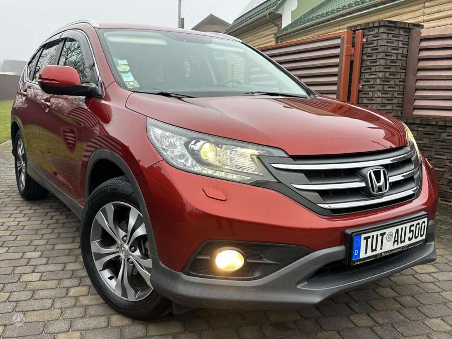 Red Honda CR-V 2014 in Vilnius, with an engine capacity of 1.60 L and mileage of 248 thousand km for 8850 €, photo 1 on AUTOMOTO.COM.LV