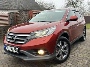 Red Honda CR-V 2014 in Vilnius, with an engine capacity of 1.60 L and mileage of 248 thousand km for 8850 €, photo 3 on AUTOMOTO.COM.LV