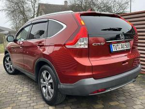 Red Honda CR-V 2014 in Vilnius, with an engine capacity of 1.60 L and mileage of 248 thousand km for 8850 €, photo 4 on AUTOMOTO.COM.LV