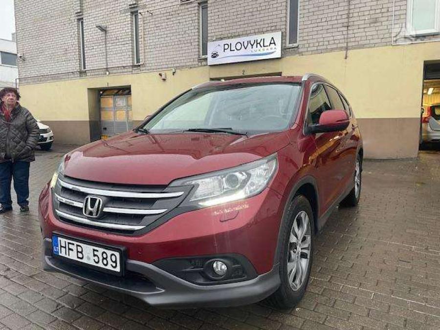 Red Honda CR-V 2014 in Vilnius, with an engine capacity of 2.00 L and mileage of 190 thousand km for 12000 €, photo 1 on AUTOMOTO.COM.LV