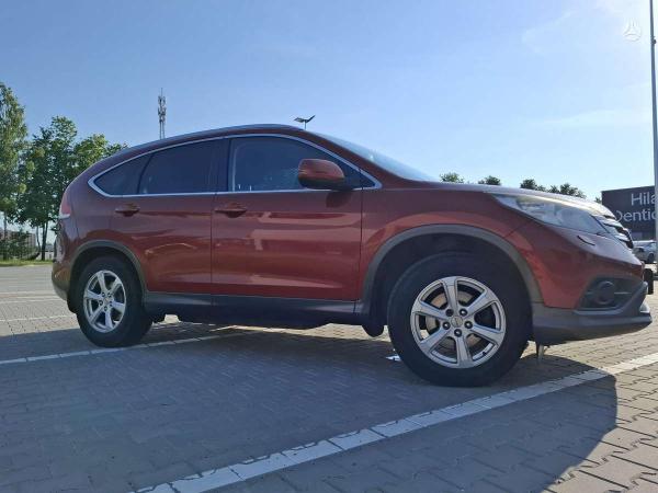 Red Honda CR-V 2014 in Vilnius, with an engine capacity of 2.20 L and mileage of 280 thousand km for 11999 €, photo 6 on AUTOMOTO.COM.LV